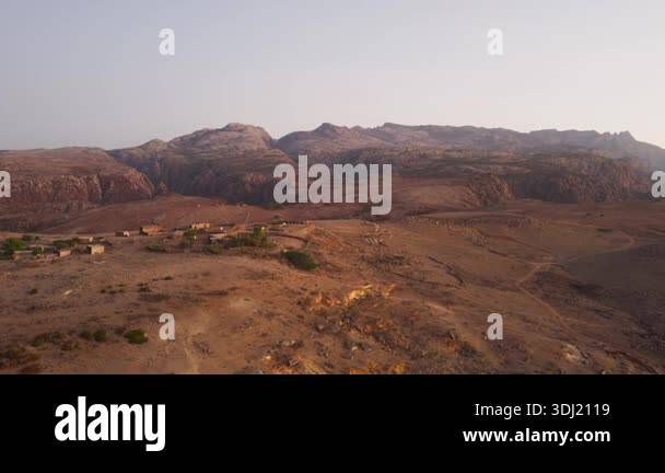 Aerial view of a remote village nestled in the mountains of Socotra ...
