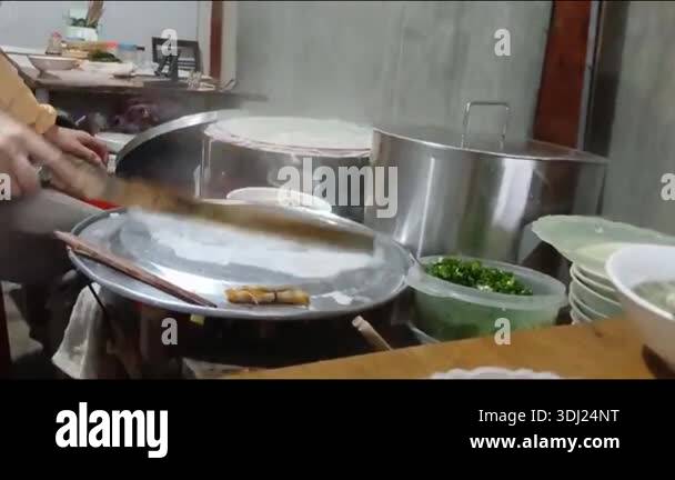 Vietnamese woman making rice cake Stock Video Footage - Alamy
