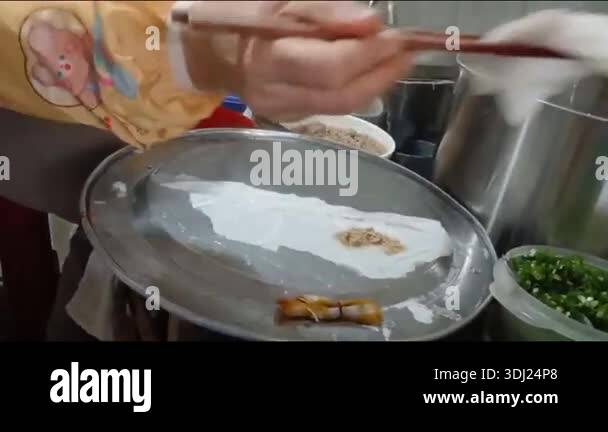 Vietnamese woman making rice cake Stock Video Footage - Alamy
