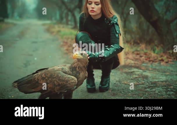 creative shooting process with animals, fashion mdel posing with wild ...