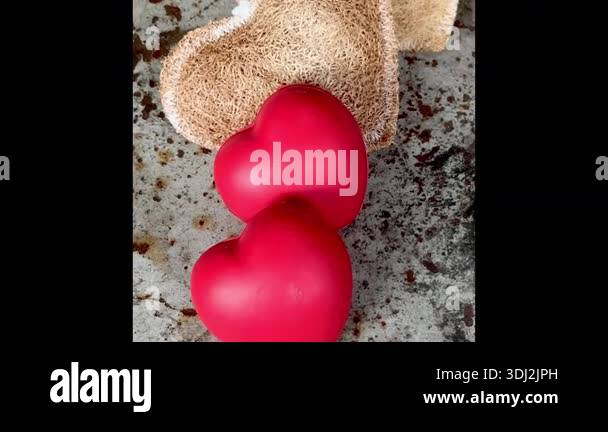 Four pieces of Small heart shape put together on background,sign and ...