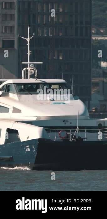 Modern catamaran ferry sailing on tagus river in lisbon, portugal, with ...