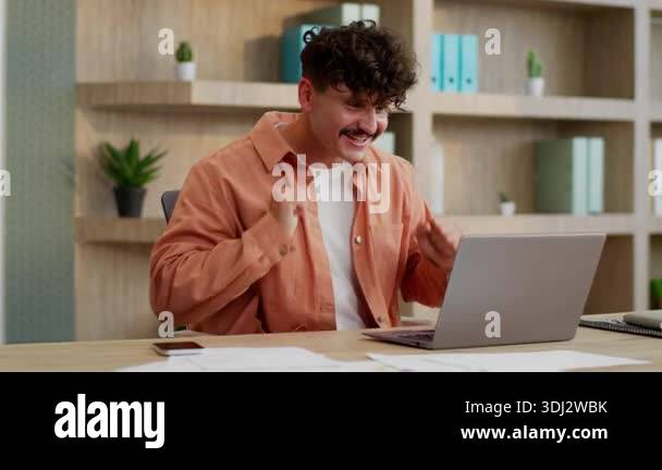 Happy Caucasian business man typing laptop dancing celebrating online ...