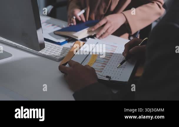 Auditor and accountant team working in office, analyze financial data ...