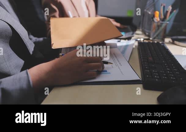 Auditor and accountant team working in office, analyze financial data ...