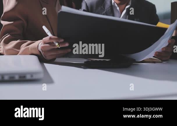 Auditor and accountant team working in office, analyze financial data ...