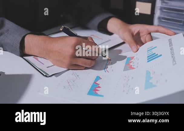 Auditor and accountant team working in office, analyze financial data ...