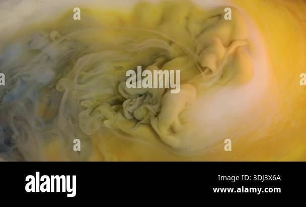 Ink blend. Underwater yellow fluid. Defocused blue white color cloud ...