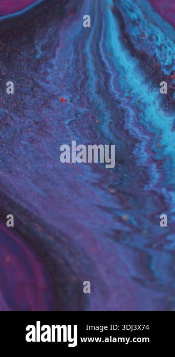 Vertical video. Ink spilling. Color flow. Defocused blue purple liquid ...