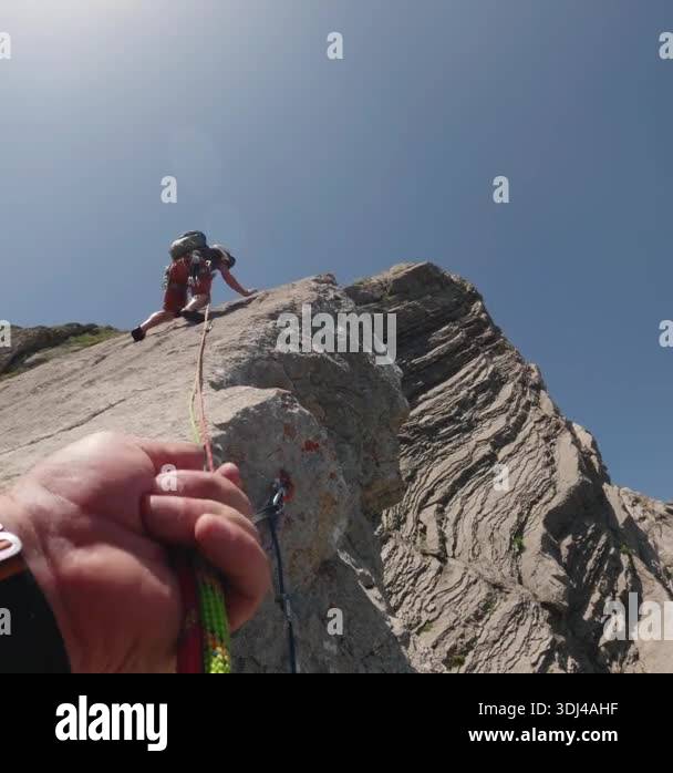 Slow Motion Lead Climbing On Sharp Alpine Cliff Edge Stock Video ...