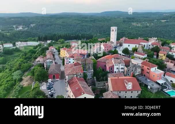 Cinematic aerial drone shot of Oprtalj hilltop medieval town in Istria ...