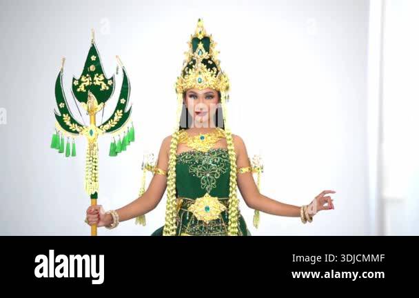 Portrait of an Indonesian woman in elegant Javanese cultural attire ...