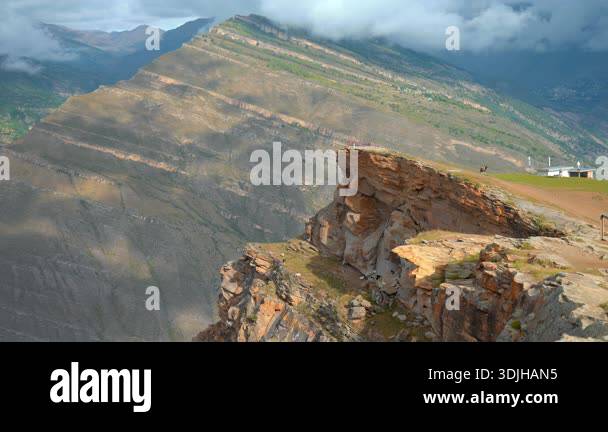 Cliff Ledge Overlooking Sweeping Canyon Valley With Golden Outcrop ...