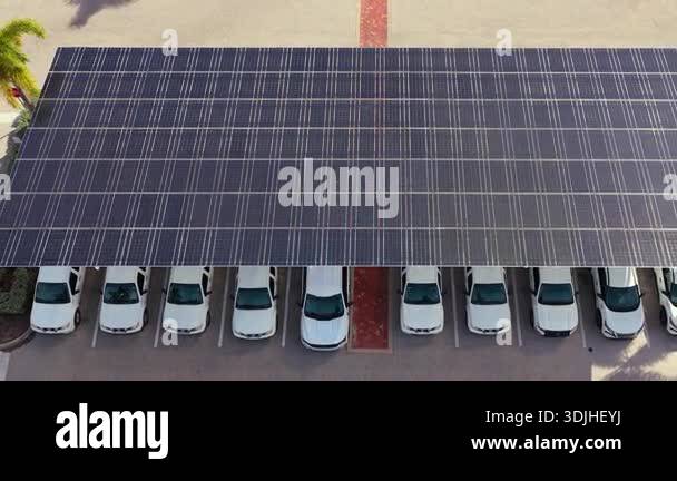 Solar-powered parking structure with photovoltaic roof panels. Urban ...