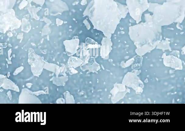 Super Slow Motion Shot of Real Ice Cuts Exploding Towards Camera on ...