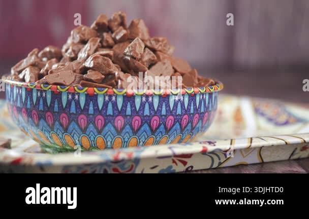 People share sweet moments while tasting chocolate pieces together ...