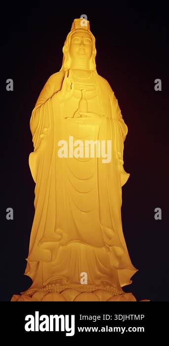 Vertical video. Lady Buddha Statue Lit Strongly from Below in Danang ...