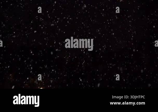 A dramatic animated video of a city at night during a powerful winter ...