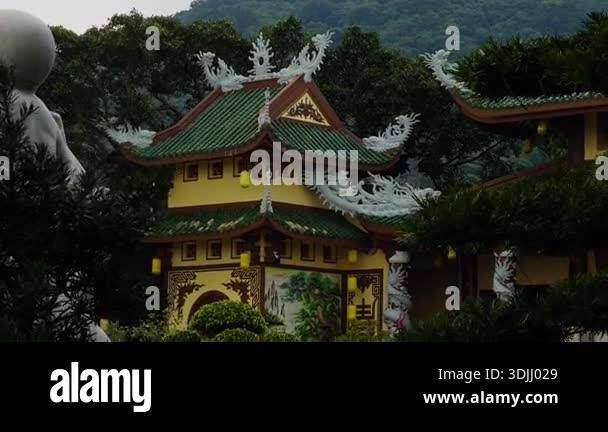 Medium View of Ornate Temple Roof with Green Tiles and White Dragon ...