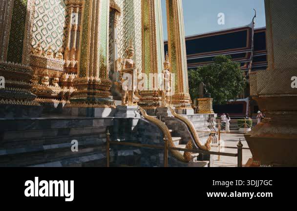Ornate golden statues and intricate mosaics decorating a building at ...