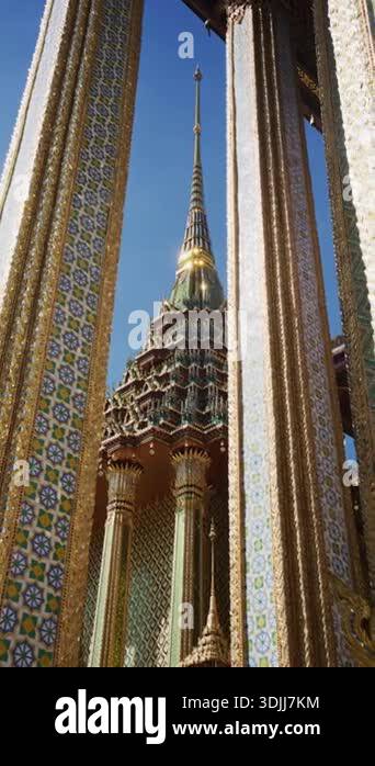 Close up low angle vertical view of golden chedi at Wat Phra Kaew ...