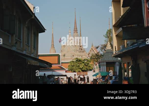 Daily life in bustling street of Bangkok with people walking. Beautiful ...