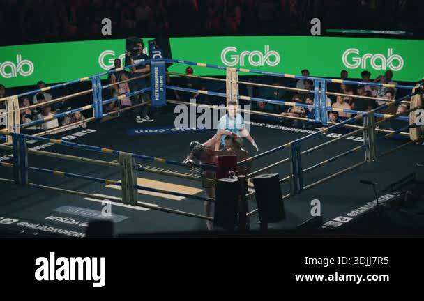 High angle view of a competitive muay thai fight inside professional ...
