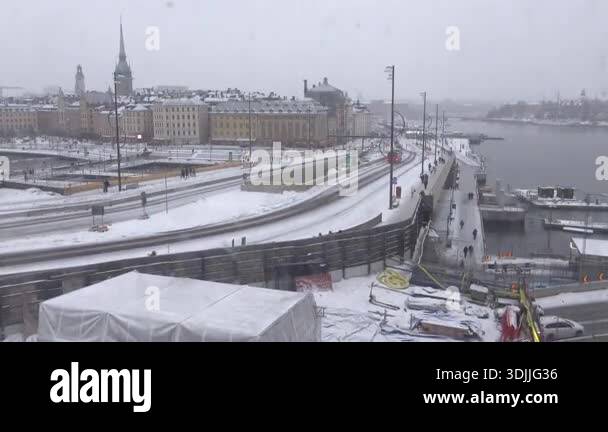 Stockholm, Sweden A view of the Slussen district in a winter snowstorm ...