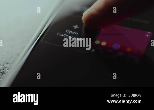 Finger tapping a smartphone screen to open the Gallery App Stock Video ...