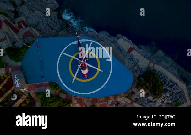 Evening coastal atmosphere with helicopter Stock Video Footage - Alamy
