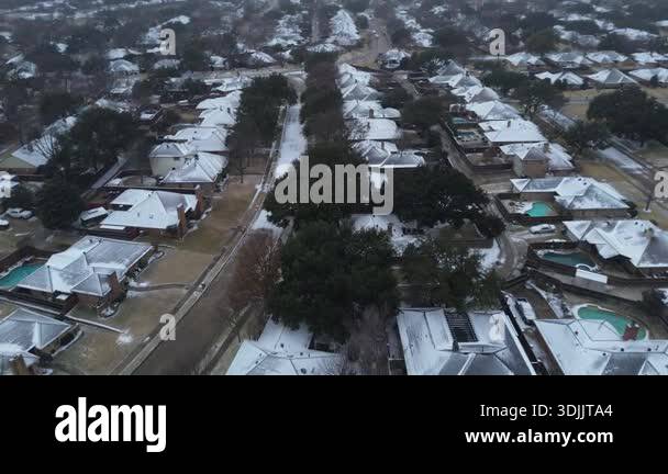 Neighborhood west of Denton Tap Road reveals icy rooftops and fenced ...