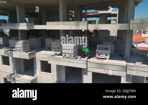 Housing project nearing completion with active facade activities Stock ...