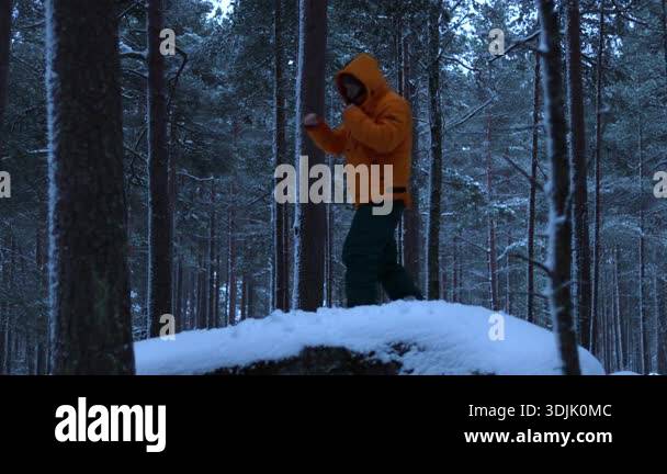 Man boxing in winter forest, sport and healthy lifestyle concept. 4K ...
