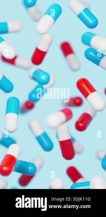 Animation of blue red white medicine capsules rotating against blue ...