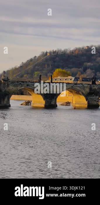 Prague Charles Bridge 4K Slow Motion Aerial View. Vertical cinematic 4K ...