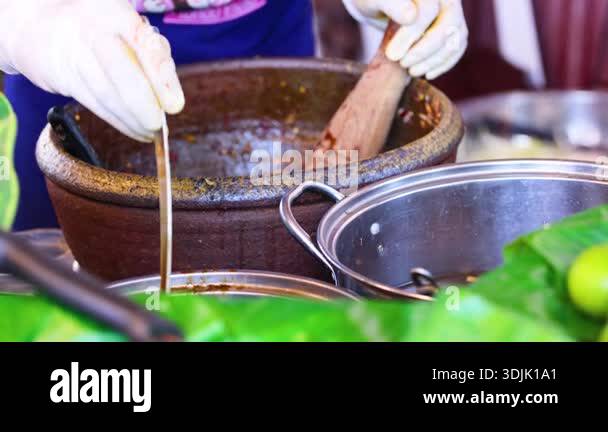 Hands preparing papaya salad with fresh ingredients Stock Video Footage ...