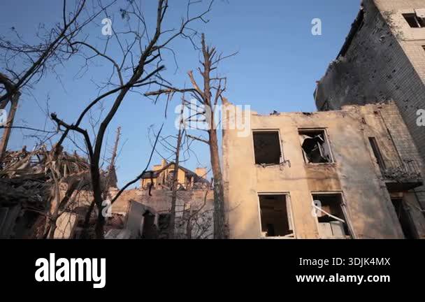 engulfed in flames, Disaster response, Rubble pile. Water pours from ...