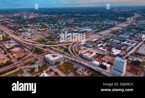Approaching large interchange with numerous cars. Hectic traffic in ...