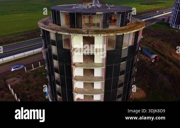 Cylinder-shaped design of the high-rise building under construction ...