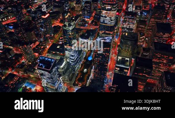 Spectacular skyscrapers of modern metropolis with neon illumination ...