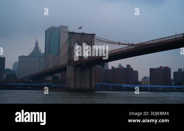 New York, USA, 24 December 2025: Brooklyn Bridge on cloudy winter ...