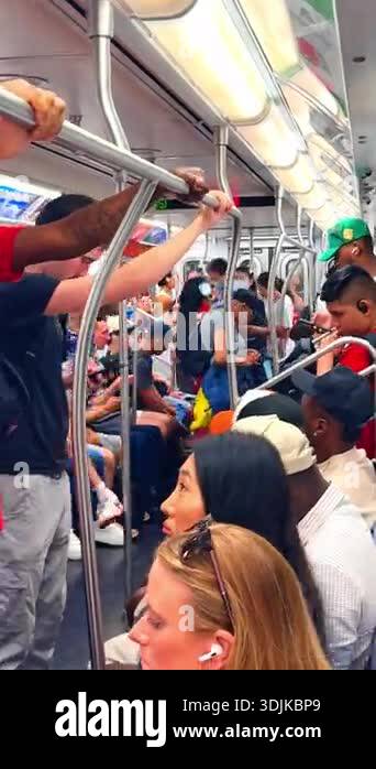 New York, USA, 24 May 2025: Guy tumbling on the railings in the crowded ...