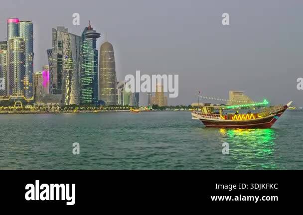 Doha, Qatar-October 21 2025: Doha skyline at sunset from the corniche ...