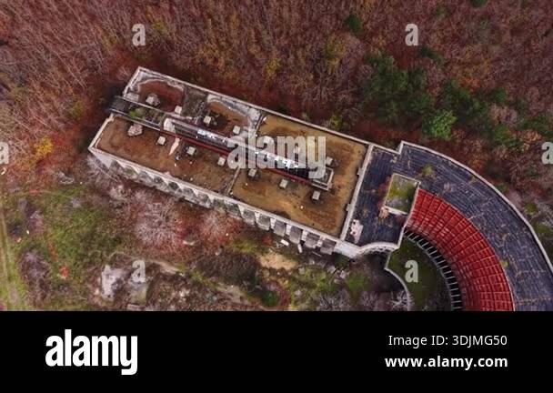 This aerial perspective showcases a desolate amusement park, where ...