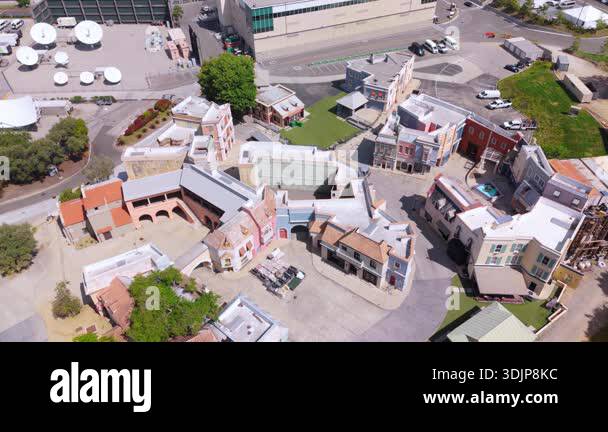 Static top-down aerial shot of a vibrant backlot set at Universal ...