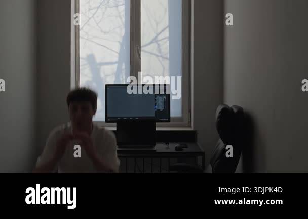 Employee taking stretch break in home office, corporate wellness ...