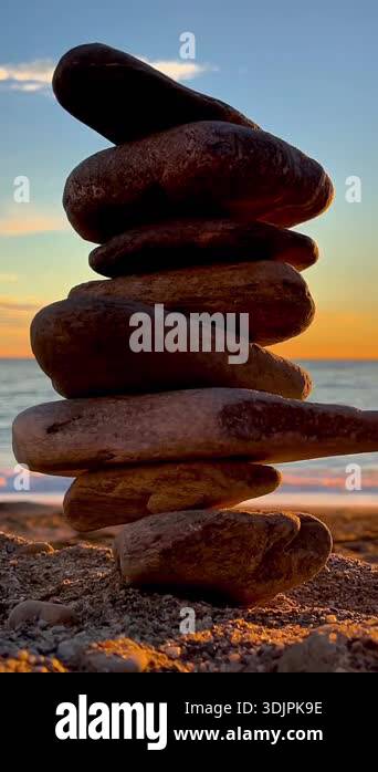 stack of stones on the beach, zen, relaxation,meditation concept ...