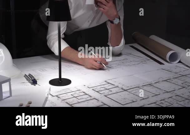 Overworked architect man feeling headache and stress during late night ...