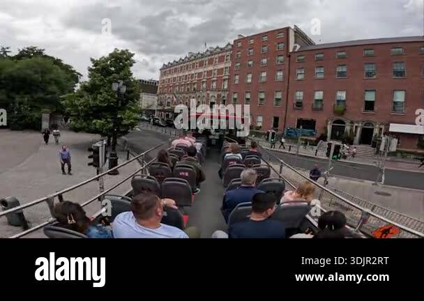 DUBLIN, IRELAND - JULY 17, 2025 - Passing Merrion Row in a sightseeing ...
