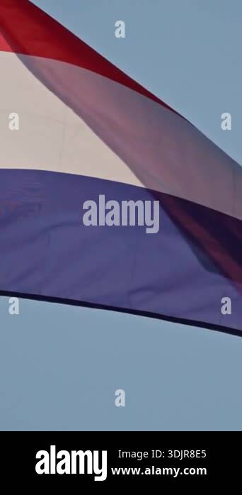 Netherlands flag waving in the wind montage Stock Video Footage - Alamy